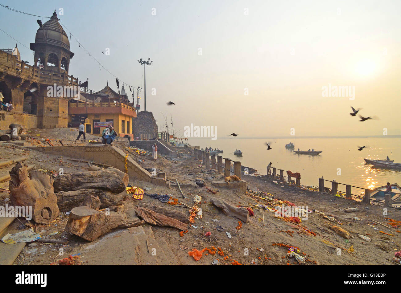Manikarnika Ghat, the holy cremation ground for the Hindus, on the bank ...