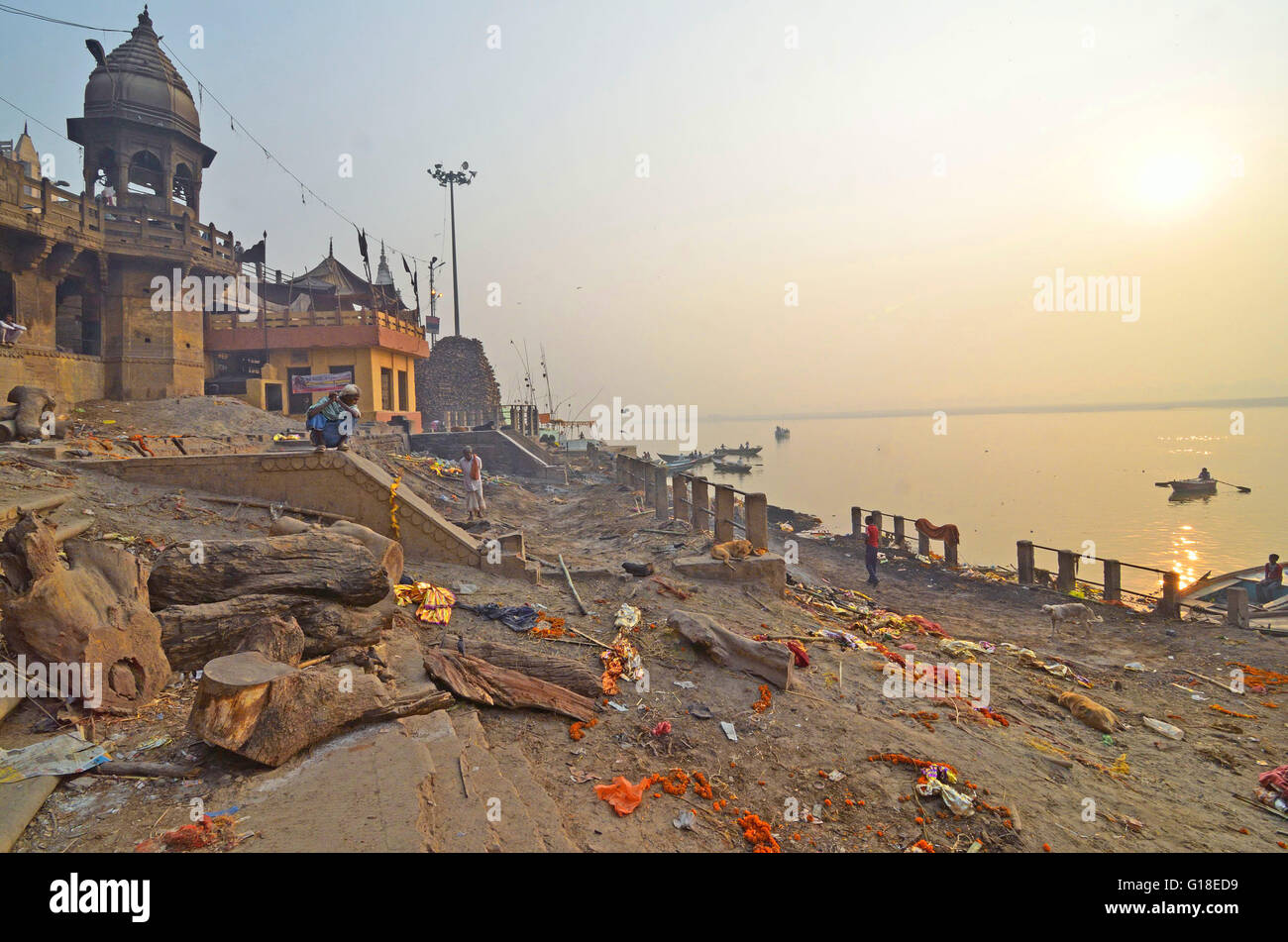 Manikarnika Ghat, the holy cremation ground for the Hindus, on the bank ...