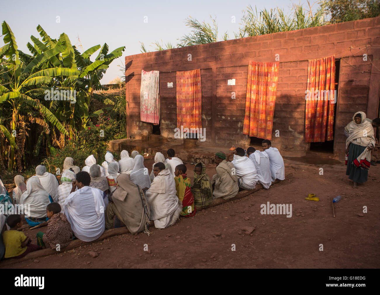 Pilgrims waiting to take a holy water bath during kidane mehret ...