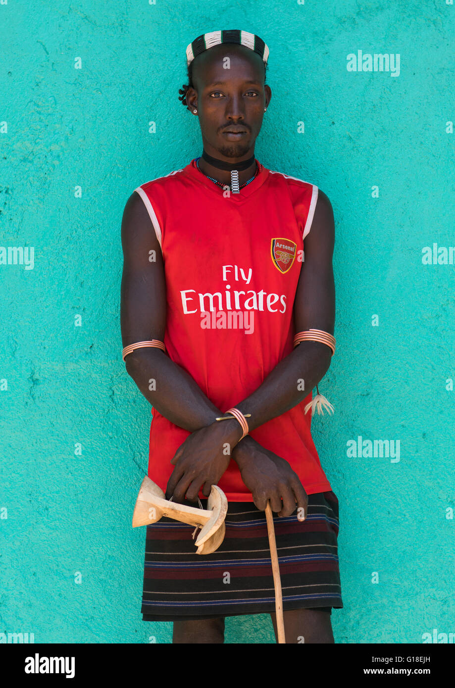Portrait of a hamer tribe man with arsenal football shirt, Omo valley ...