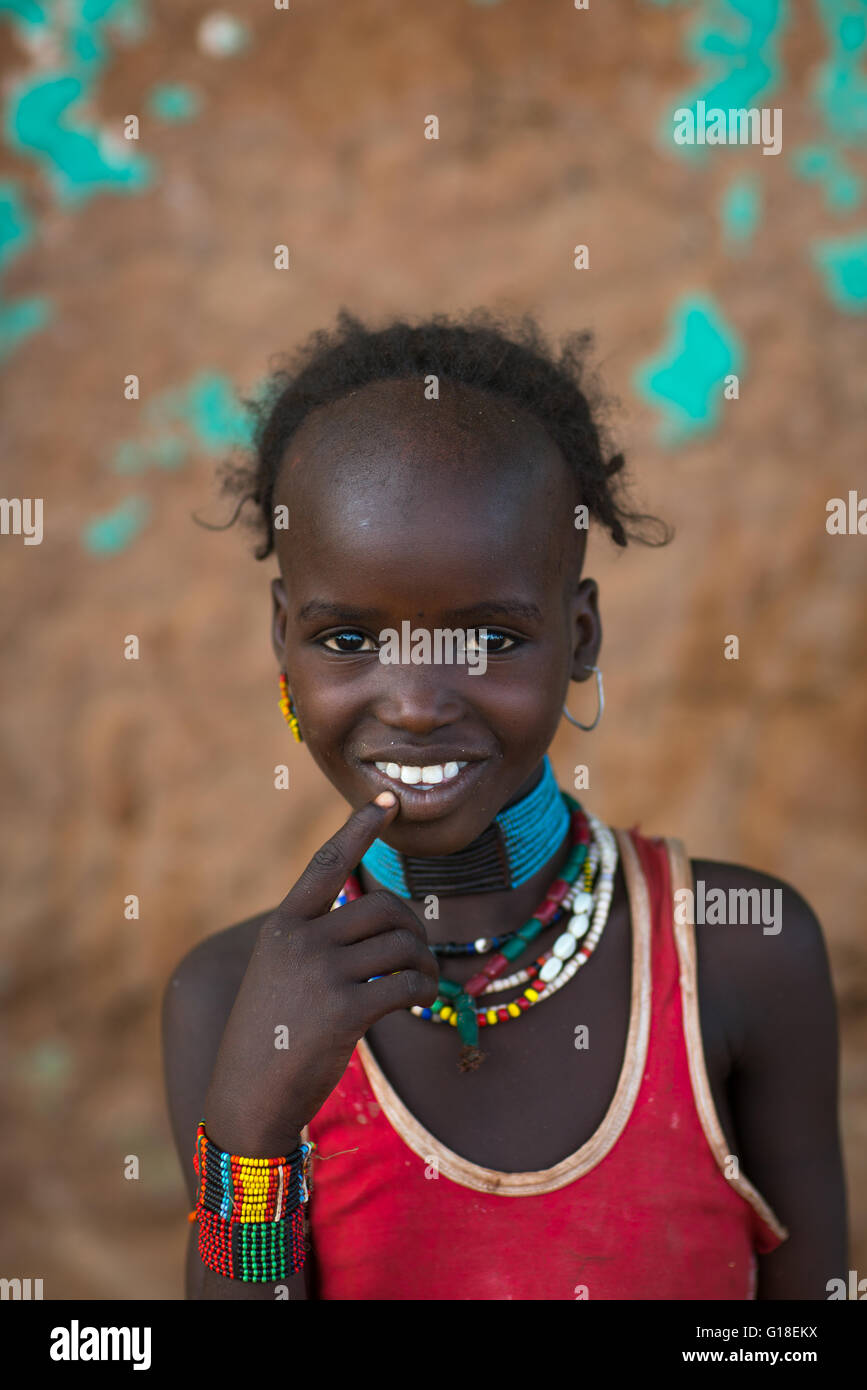 Portrait of a smiling hamer tribe girl, Omo valley, Turmi, Ethiopia ...