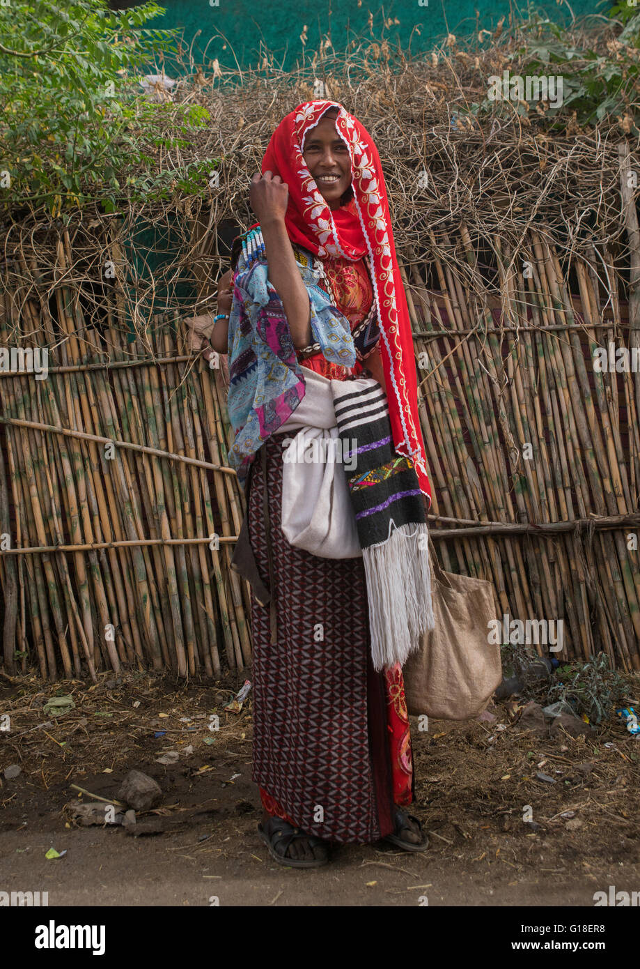 Raya tribe woman with a beaded baby carrier, Semien wollo zone, Woldia ...