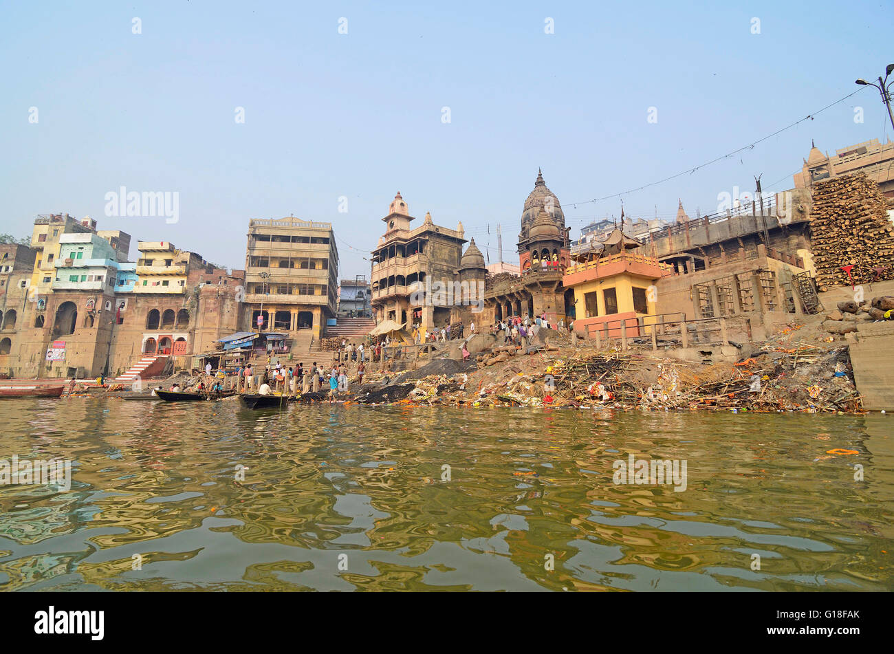 Manikarnika Ghat, the holy cremation ground for the Hindus, on the bank ...