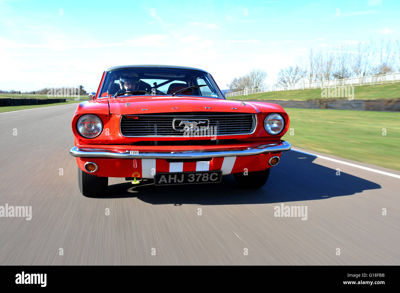 First generation Ford Mustang coupe race car at Goodwood Stock Photo ...