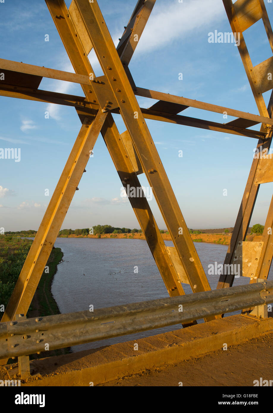 Metal bridge being built by chinese workers above omo river, Omo valley ...