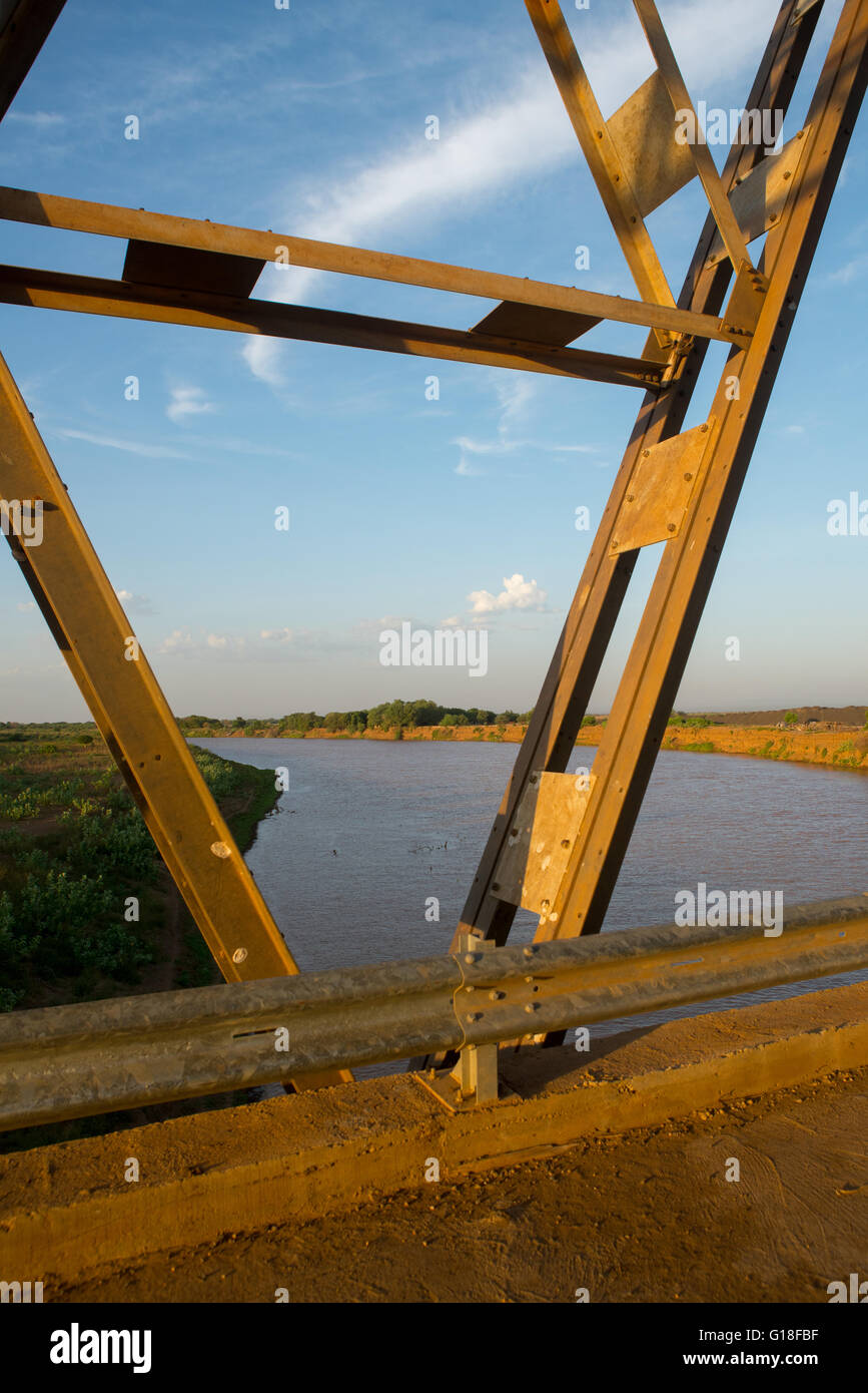Metal bridge being built by chinese workers above omo river, Omo valley ...