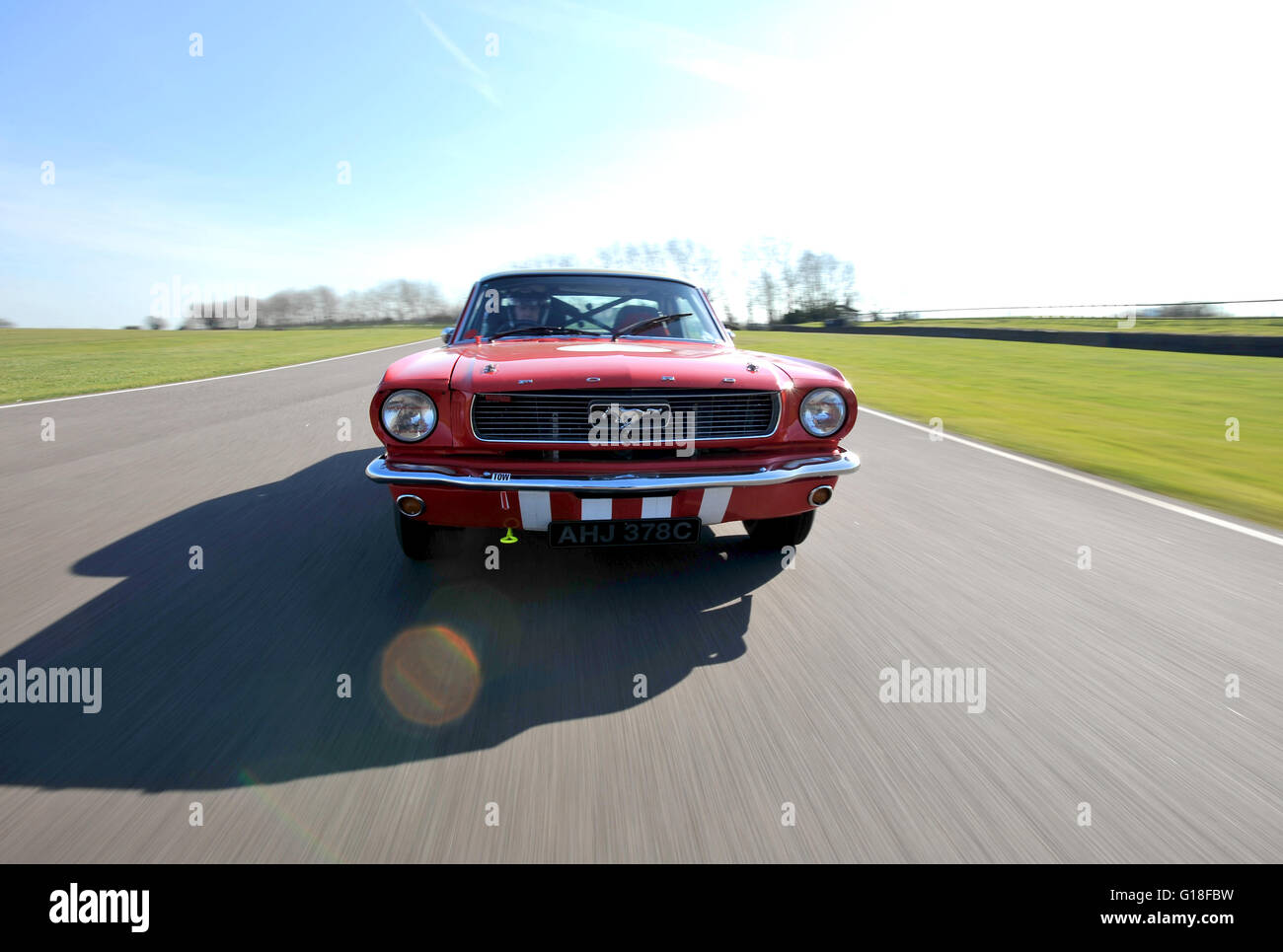 First generation Ford Mustang coupe race car at Goodwood Stock Photo ...