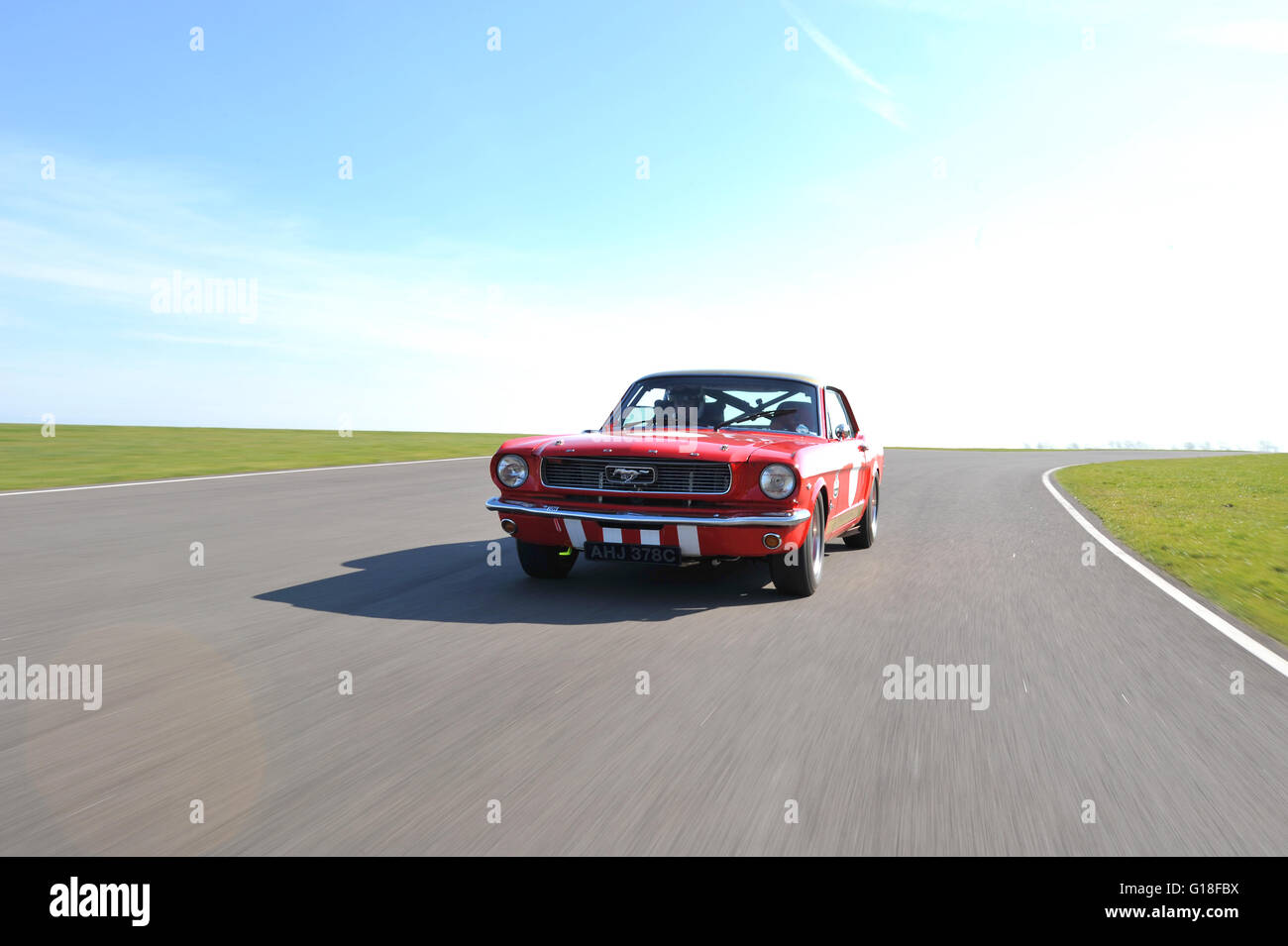 First generation Ford Mustang coupe race car at Goodwood Stock Photo ...