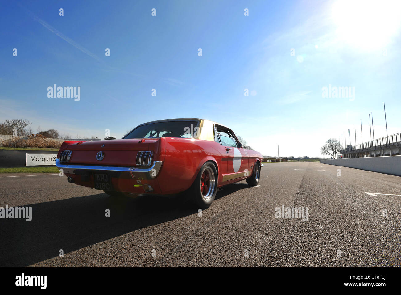 First generation Ford Mustang coupe race car at Goodwood Stock Photo ...