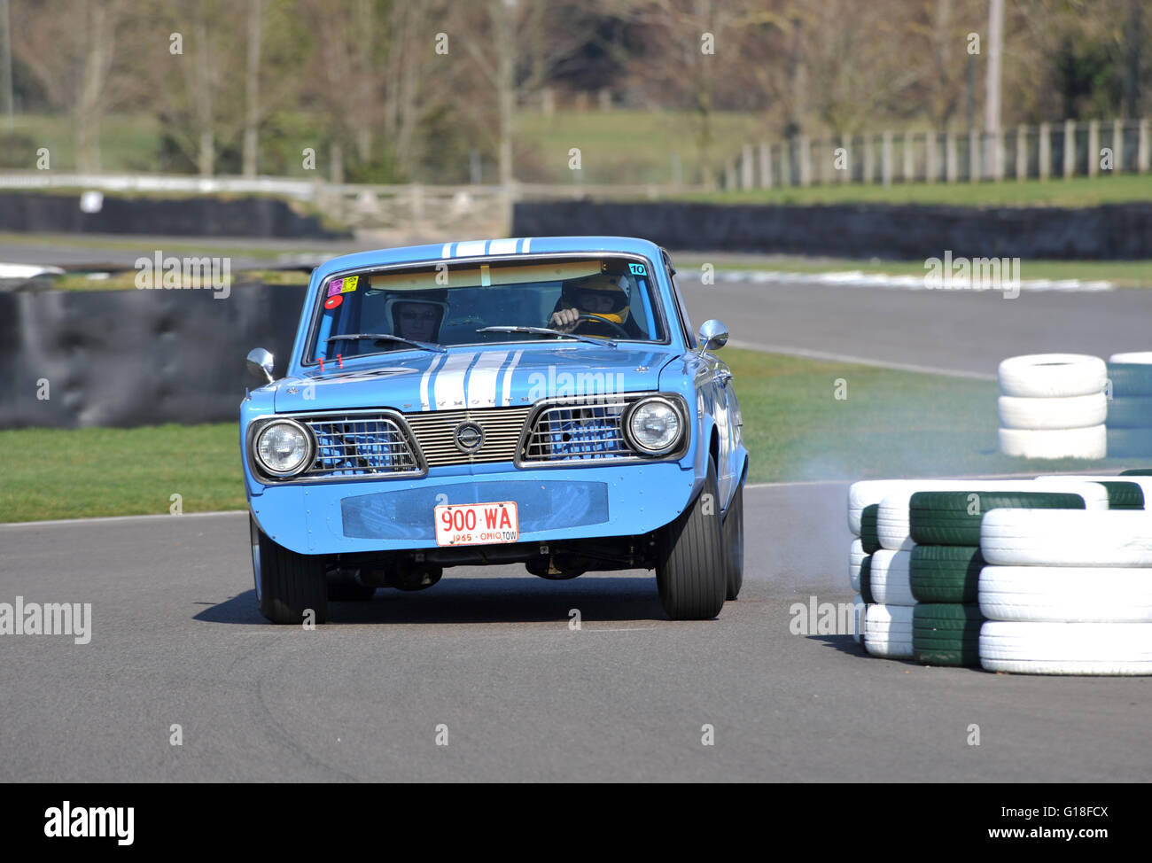 Classic 1960s race car going through the chicane at Goodwood motor ...
