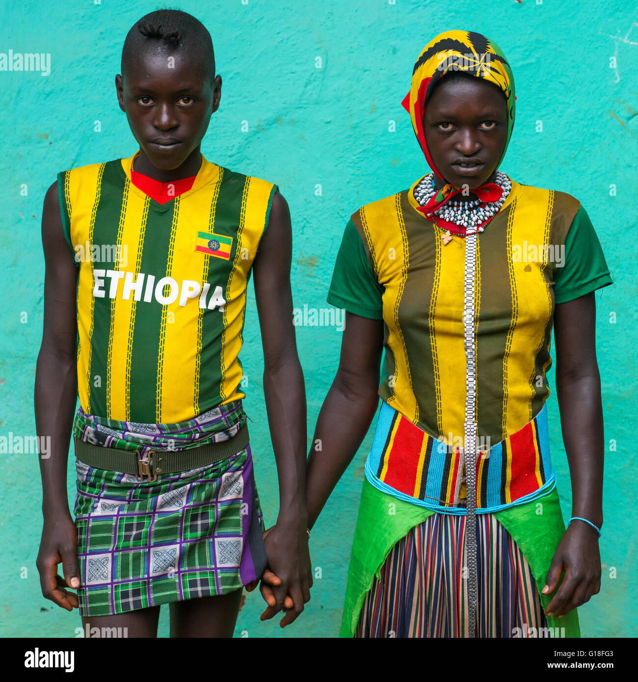 Portrait of a bana tribe couple hand in hand, Omo valley, Key afer ...