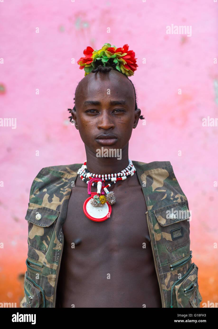 Portrait of a bana tribe man with plastic flowers in the hair, Omo ...