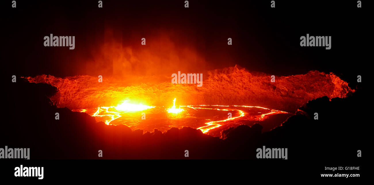 Panorama of the the living lava lake in the crater of erta ale volcano ...
