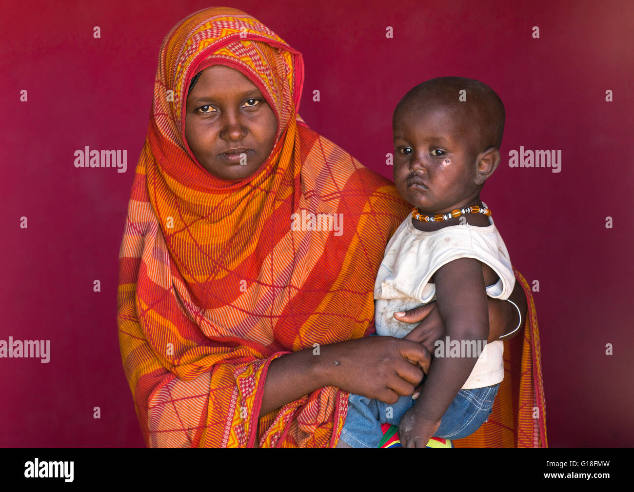 Afar tribe woman with her child, Afar region, Semera, Ethiopia Stock ...