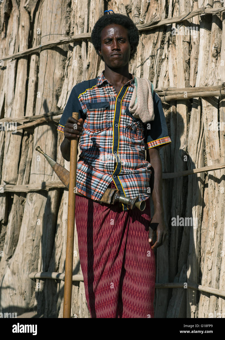 Portrait of an afar tribe man with his traditional knife, Afar region ...