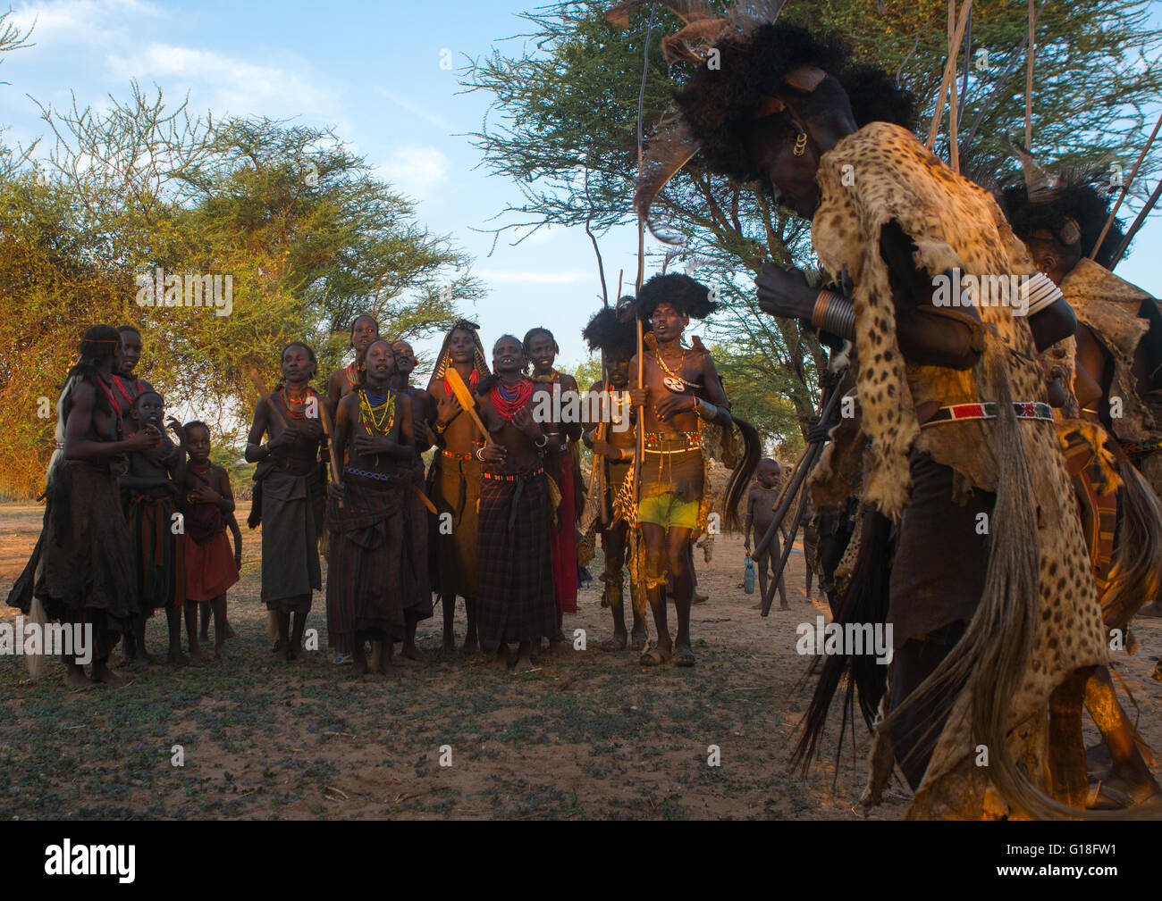 Dassanech men and women during dimi ceremony to celebrate circumcision ...