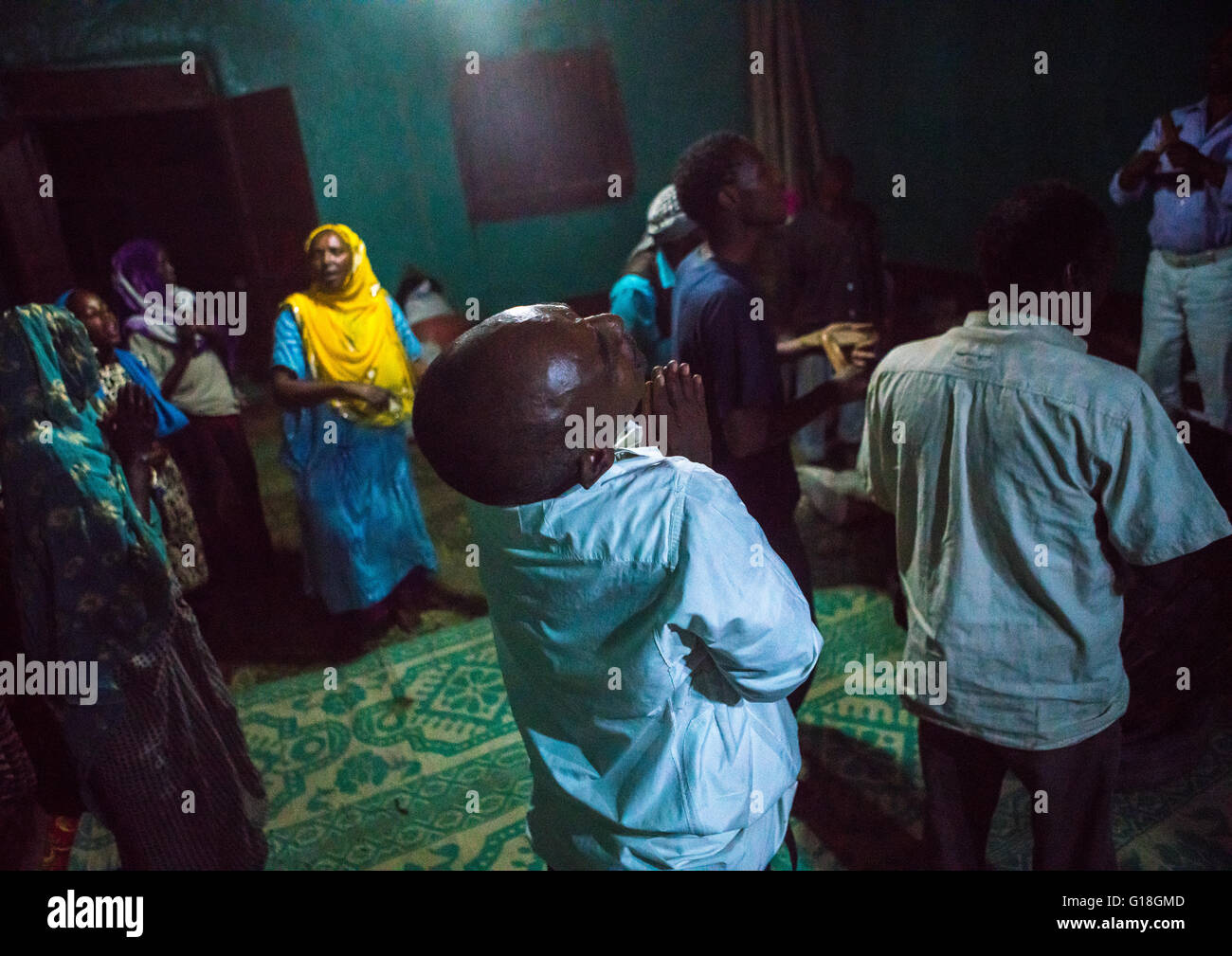 Sufi people go into a trance during a ceremony, Harari region, Harar ...