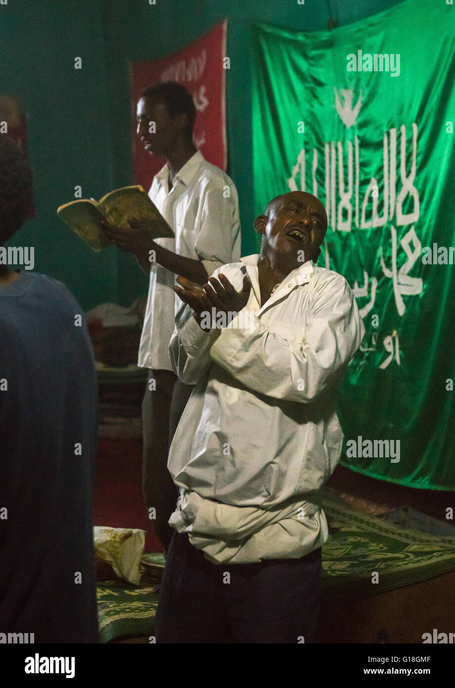 Sufi people go into a trance during a ceremony, Harari region, Harar ...