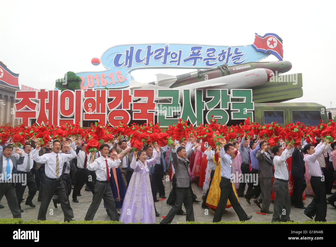 Pyongyang. 10th May, 2016. Citizens march during a mass rally and ...