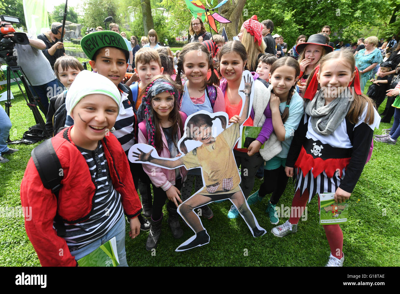 Pupils of the local Anne Frank School pose with cardboard figure ...