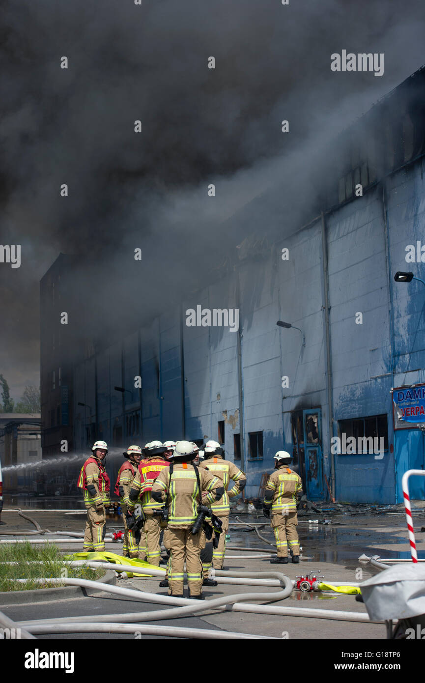 Berlin, Germany. 11th May, 2016. Firemen try to extinguish a fire at ...