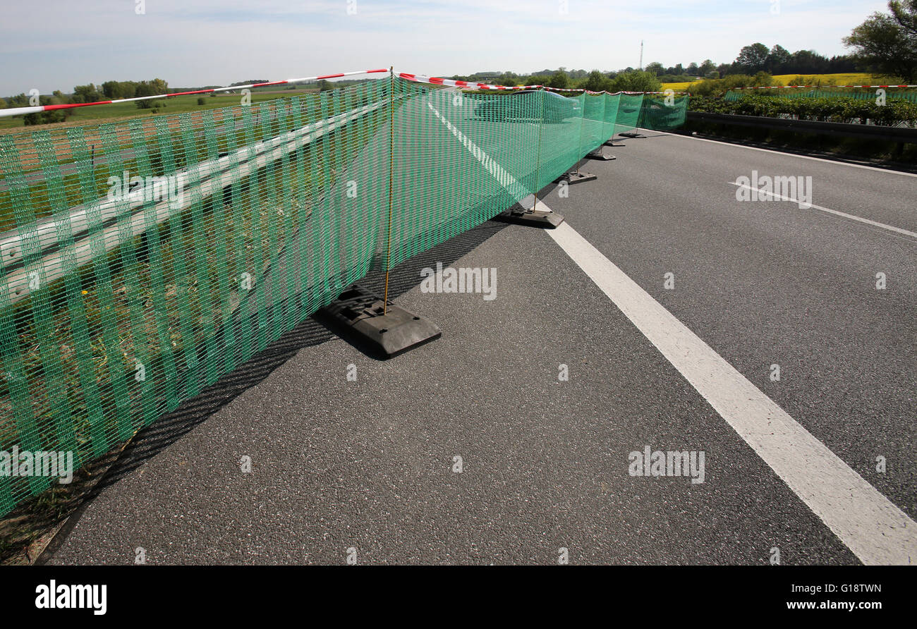 A game fence stretches along the A20 motorway between Sanitz and ...