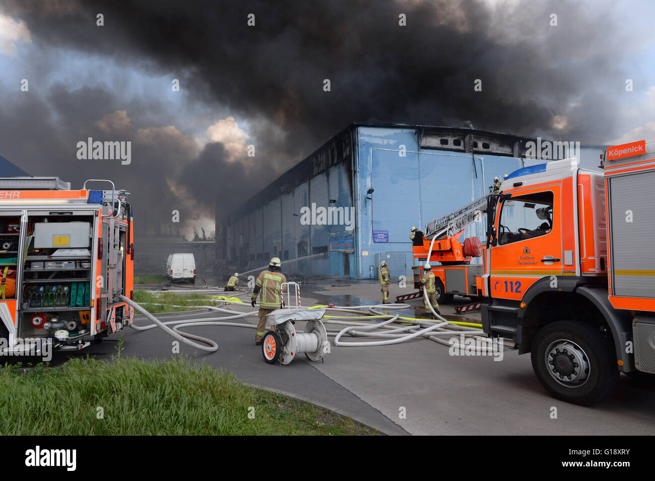 Berlin, Germany. 11th May, 2016. Thick smoke clouds can be seen as fire ...