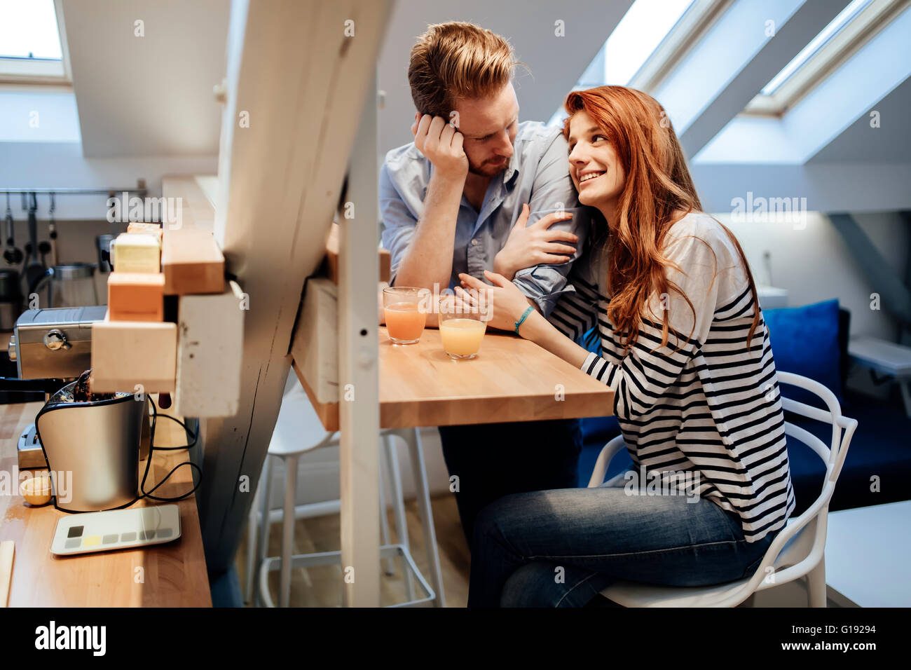 Couple in love talking smiling at home while being truly happy Stock ...