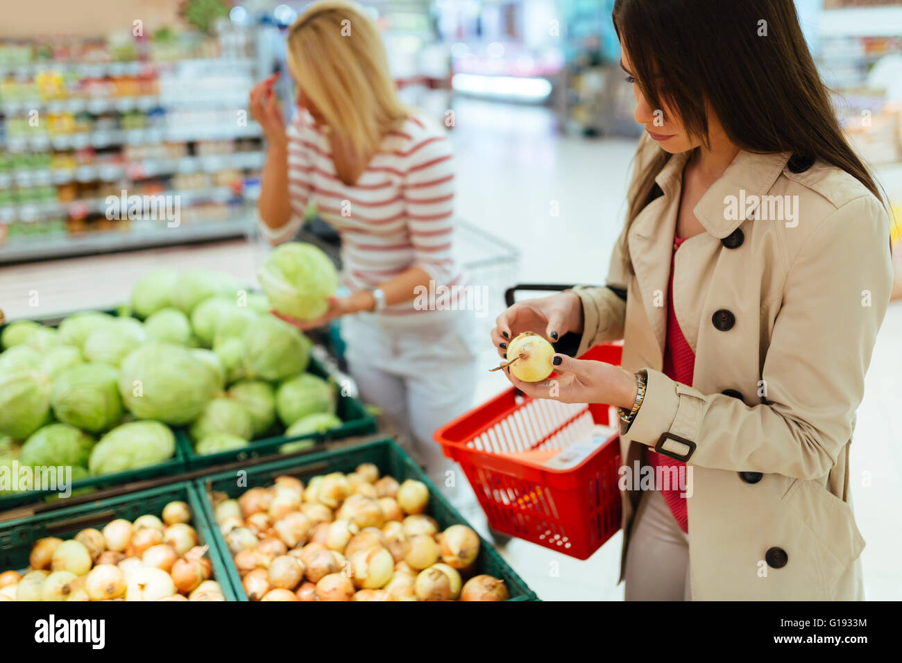 Beautiful women shopping vegetables and fruits in supermarket Stock ...