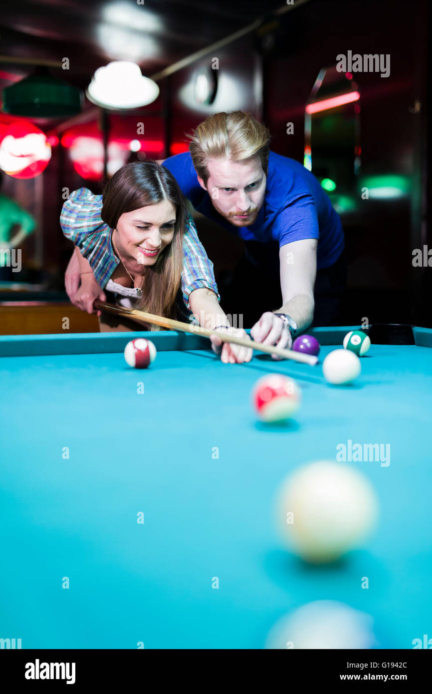 Woman looking at two men flirting bar hi-res stock photography and ...