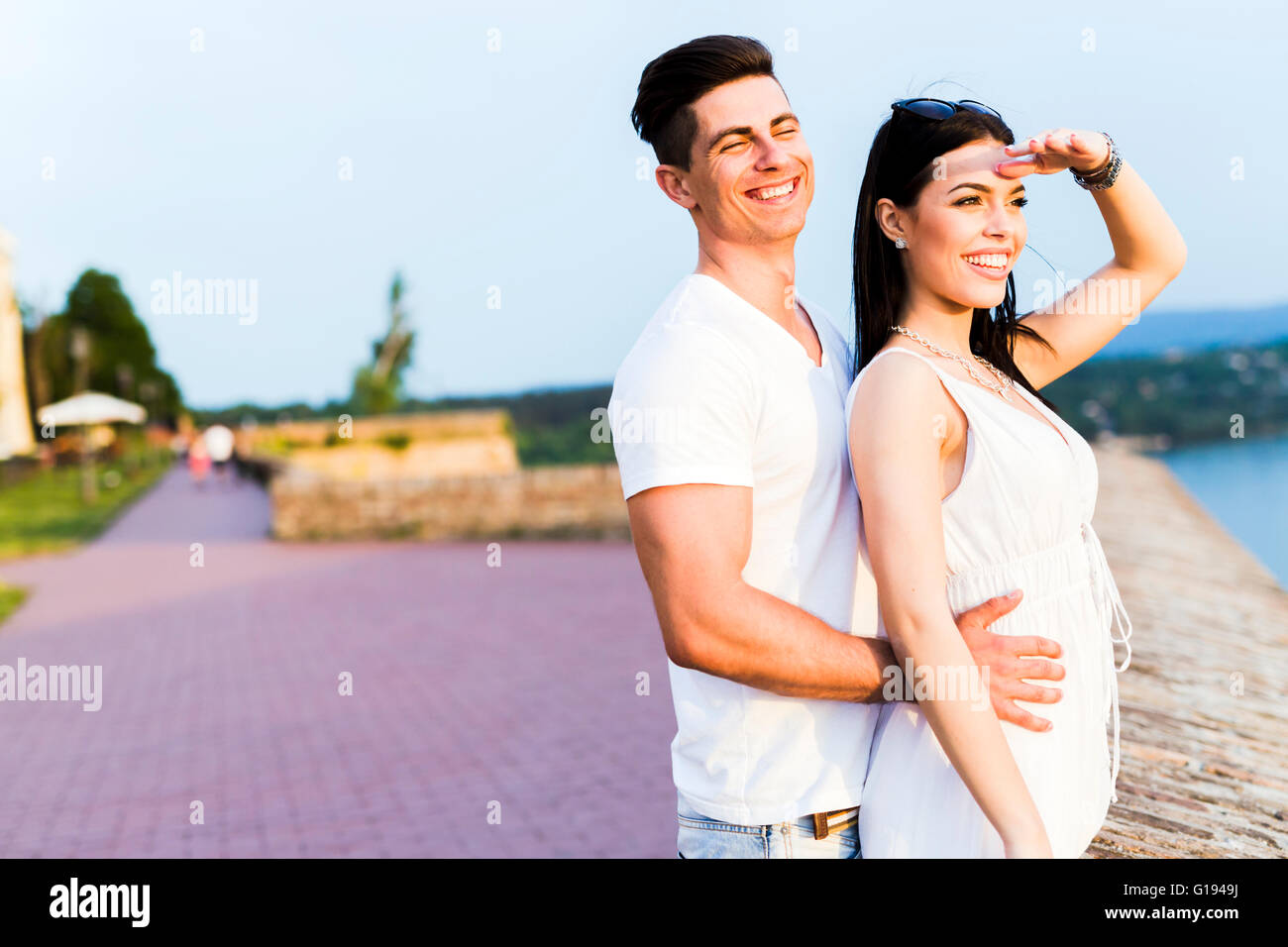 Man watching couple hugging hi-res stock photography and images - Alamy