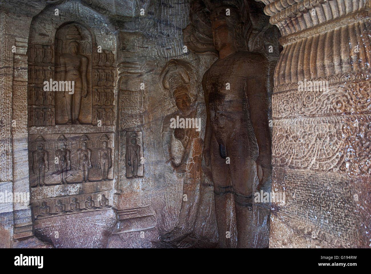 Cave 4 : Carved figure of Tirthankara Parshvanath with his head ...