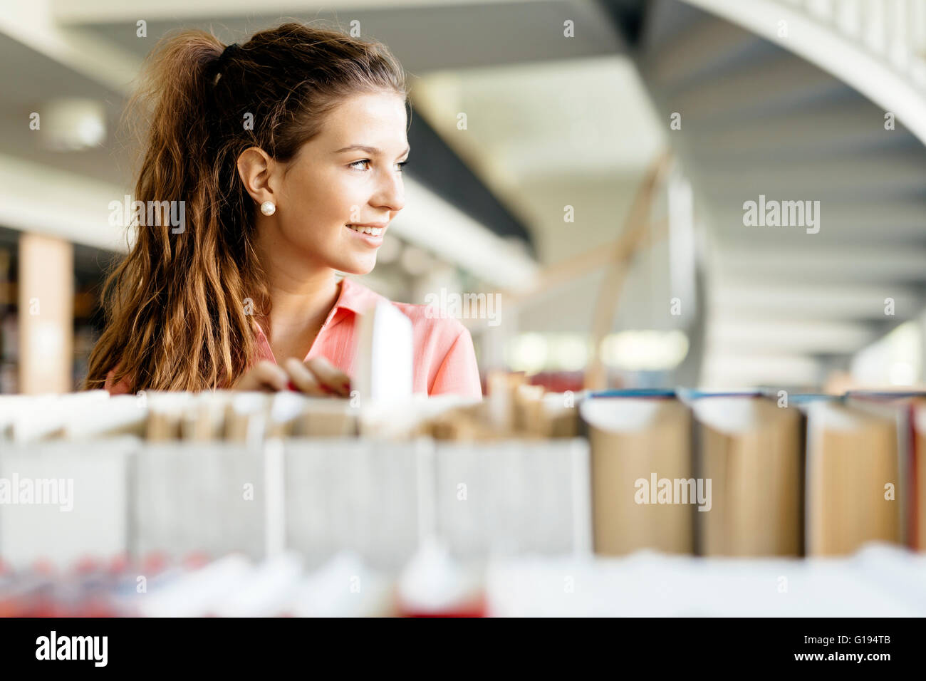 Picking off shelf High Resolution Stock Photography and Images - Alamy