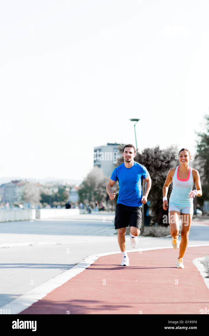 People jogging on track park hi-res stock photography and images - Alamy