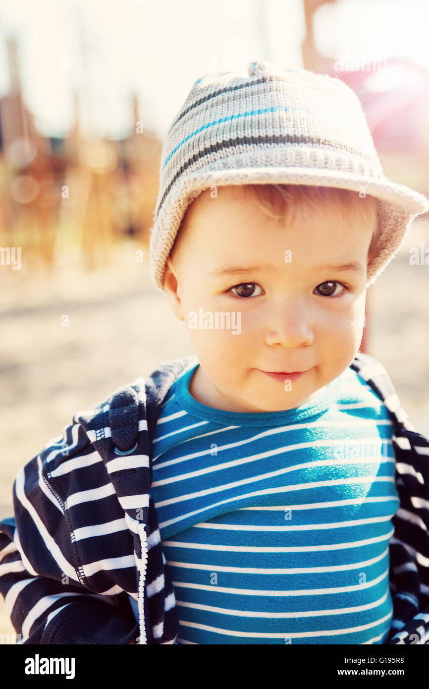 Boy playing on playground hi-res stock photography and images - Alamy