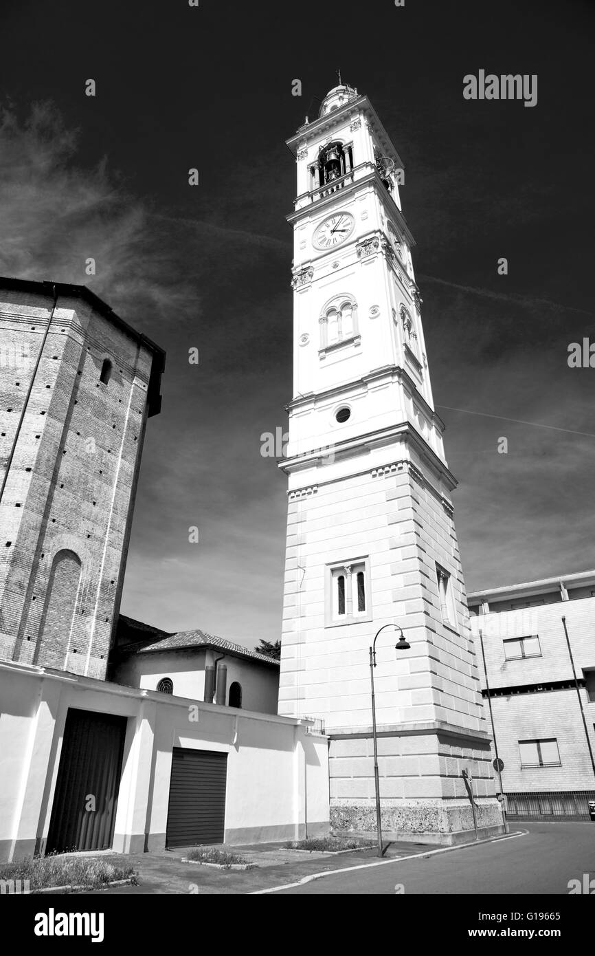ancien clock tower in italy europe old stone and bell Stock Photo - Alamy