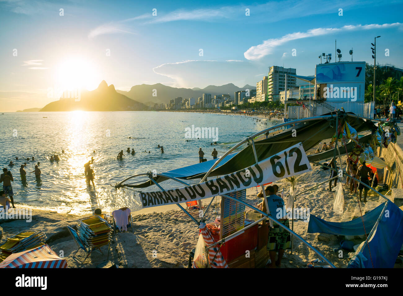 RIO DE JANEIRO - FEBRUARY 21, 2016: Crowds of people line the beach at ...
