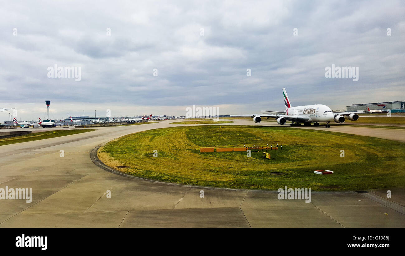 Emirates A380 approaches the runway at Heathrow Airport Stock Photo - Alamy