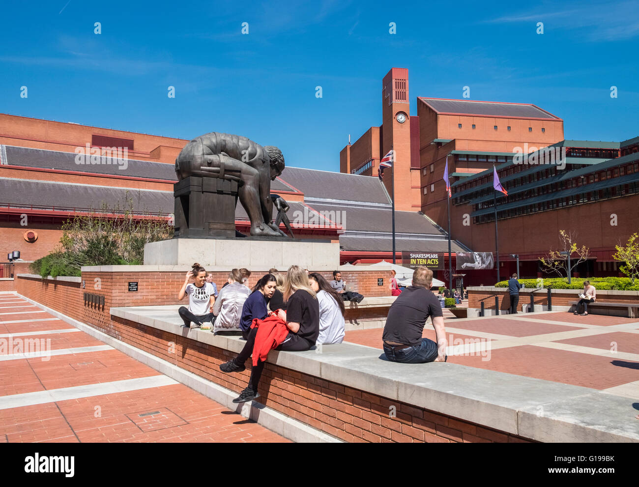People sitting outside in grounds of the British Library, Euston Road ...
