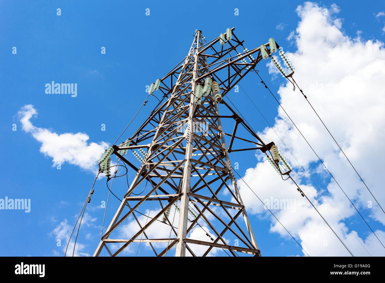 High voltage tower with ragged high-voltage line Stock Photo - Alamy