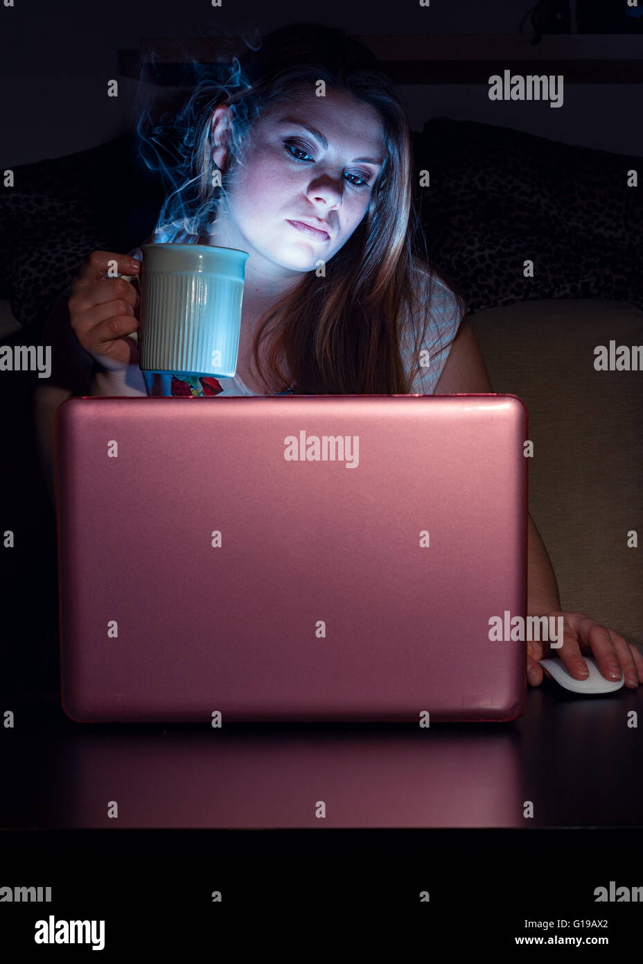 woman at computer with steaming cup Stock Photo - Alamy