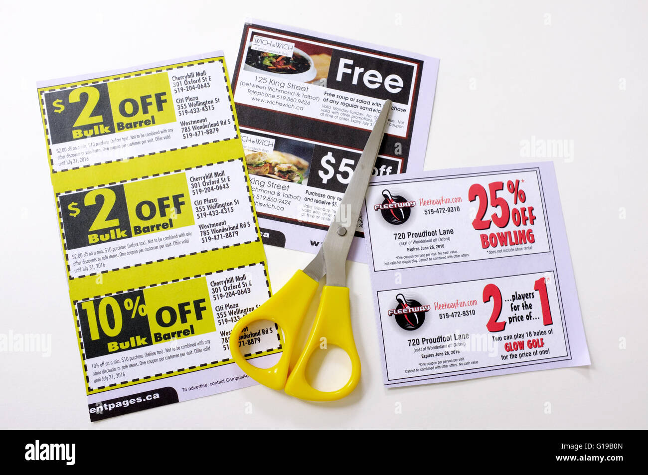 Coupons scissors hi-res stock photography and images - Alamy Coupons scissors hi-res stock photography and images - Alamy