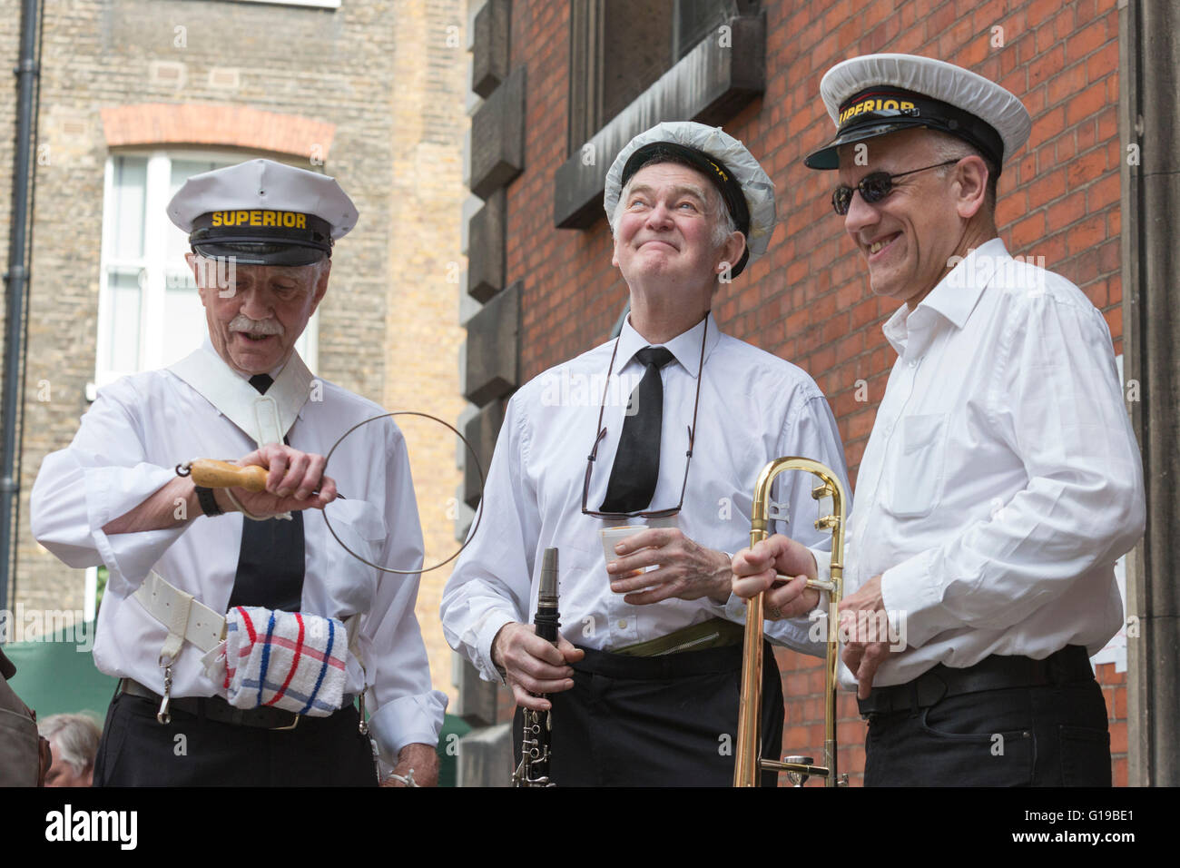 Members of a brass marching band relaxing before the parade. The 41st ...
