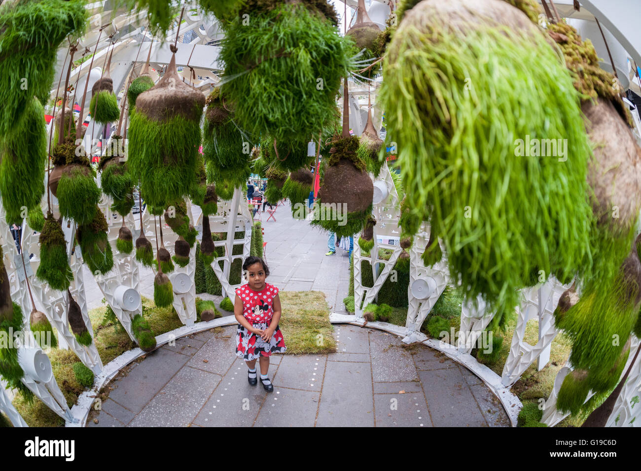 Hanging plants adorn the Times Square Electronic Garden in New York on ...