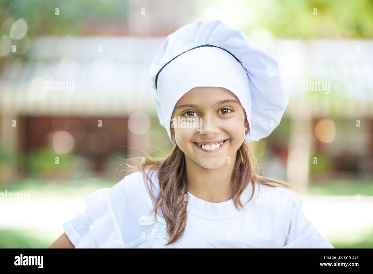 Girl chef hat hi-res stock photography and images - Alamy