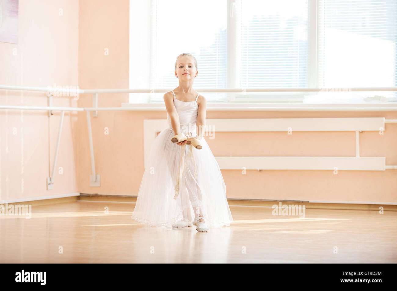Little girl dancing with pointe shoes at ballet dancing class Stock ...