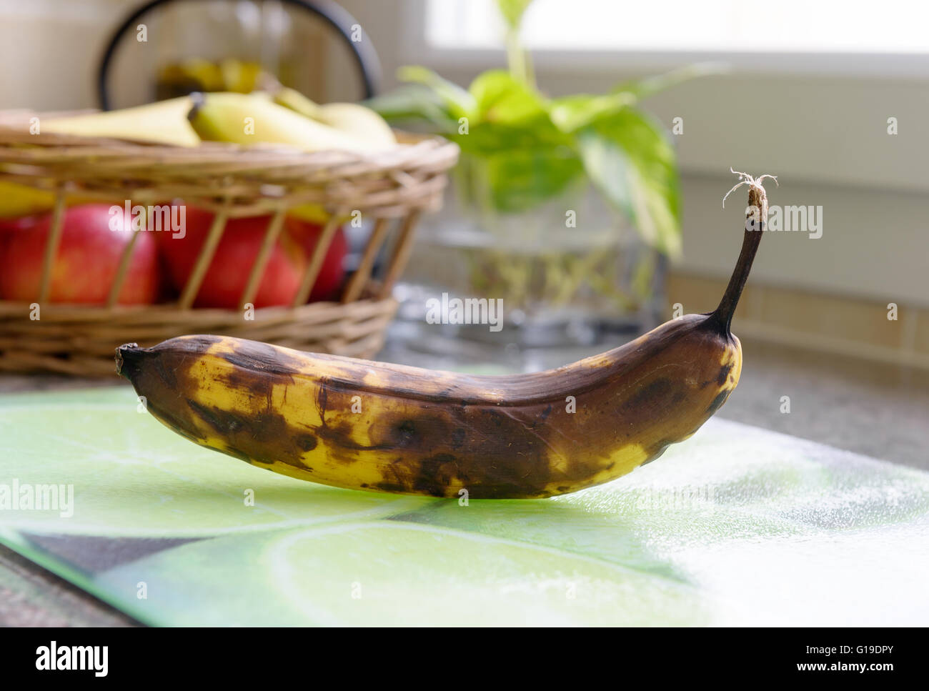 a rotten banana on the table Stock Photo - Alamy