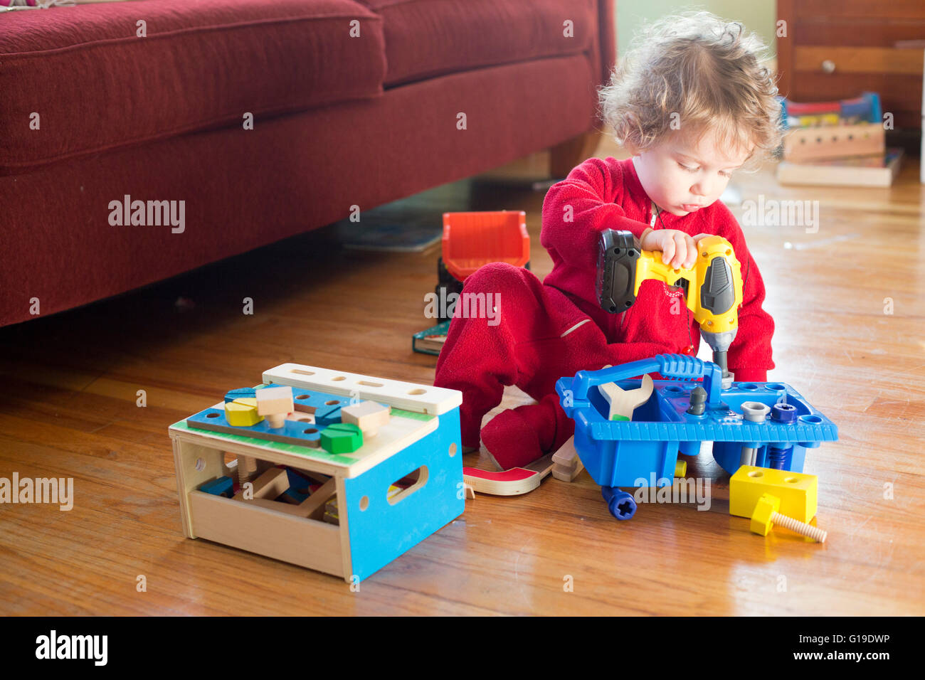 Playing with new toys after christmas Stock Photo - Alamy