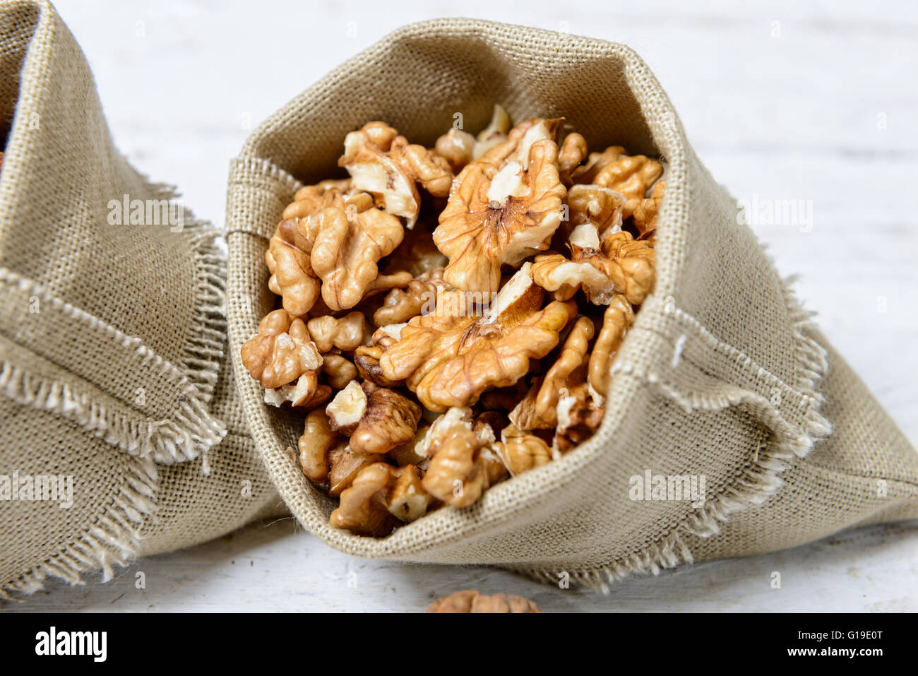 a small canvas bag with walnuts Stock Photo - Alamy