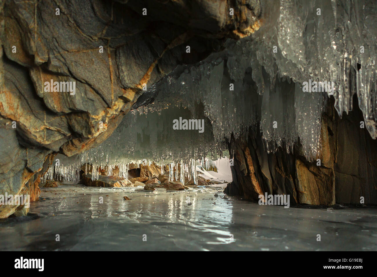 Multicolored stone grotto with icicles Stock Photo - Alamy